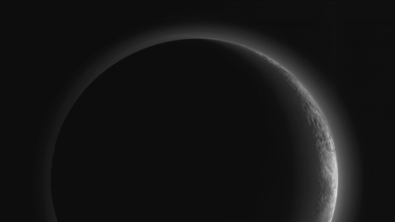 A crescent Pluto shines like a jewel in the Kuiper Belt – Spaceflight Now