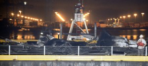 SpaceX rocket wreckage back on shore after near-miss at landing ...