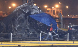 SpaceX rocket wreckage back on shore after near-miss at landing ...