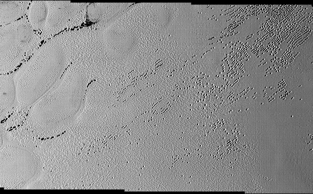 Pluto’s floating mountains, intriguing structures fascinate scientists ...