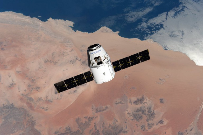 Photos: Dragon completes rendezvous with the station – Spaceflight Now