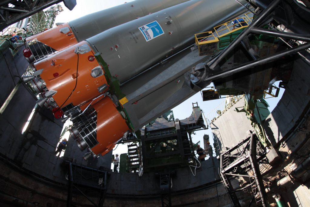 Photos: Soyuz rocket goes vertical for launch of next station crew ...