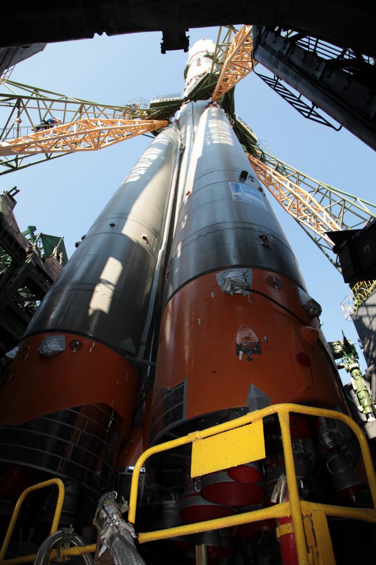 Photos: Soyuz rocket goes vertical for launch of next station crew ...
