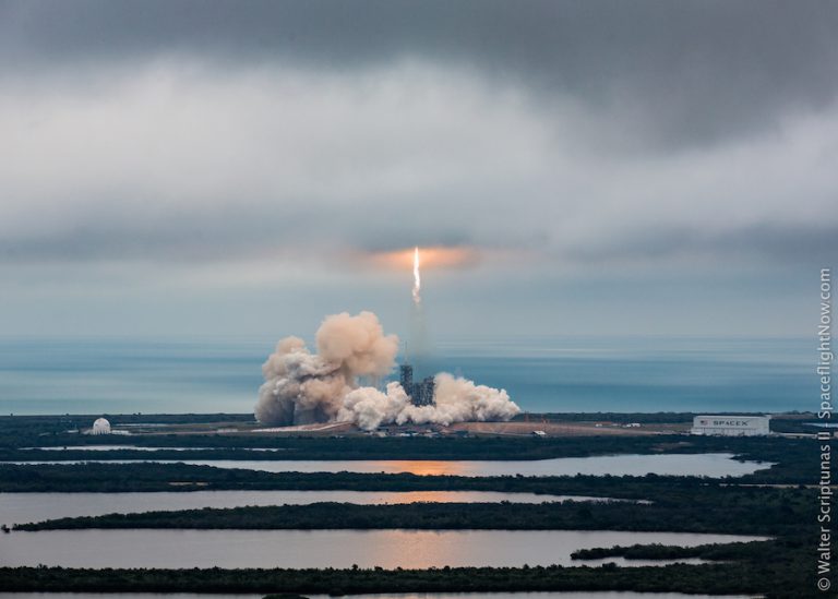Photos: Falcon 9 rocket soars into overcast sky from pad 39A ...