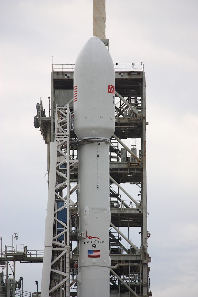Photos: Falcon 9 booster, minus landing legs and grid fins, poised for ...