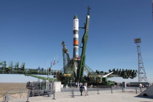 Soyuz booster rolls out for launch with space station cargo freighter ...