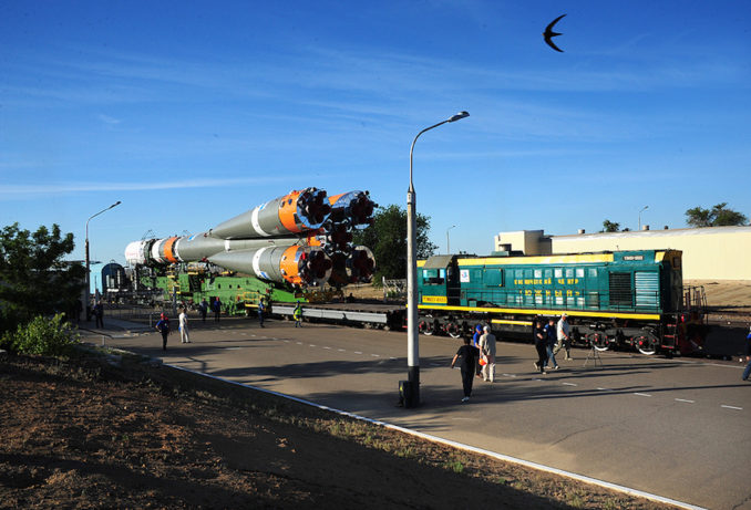 Soyuz booster rolls out for launch with space station cargo freighter ...