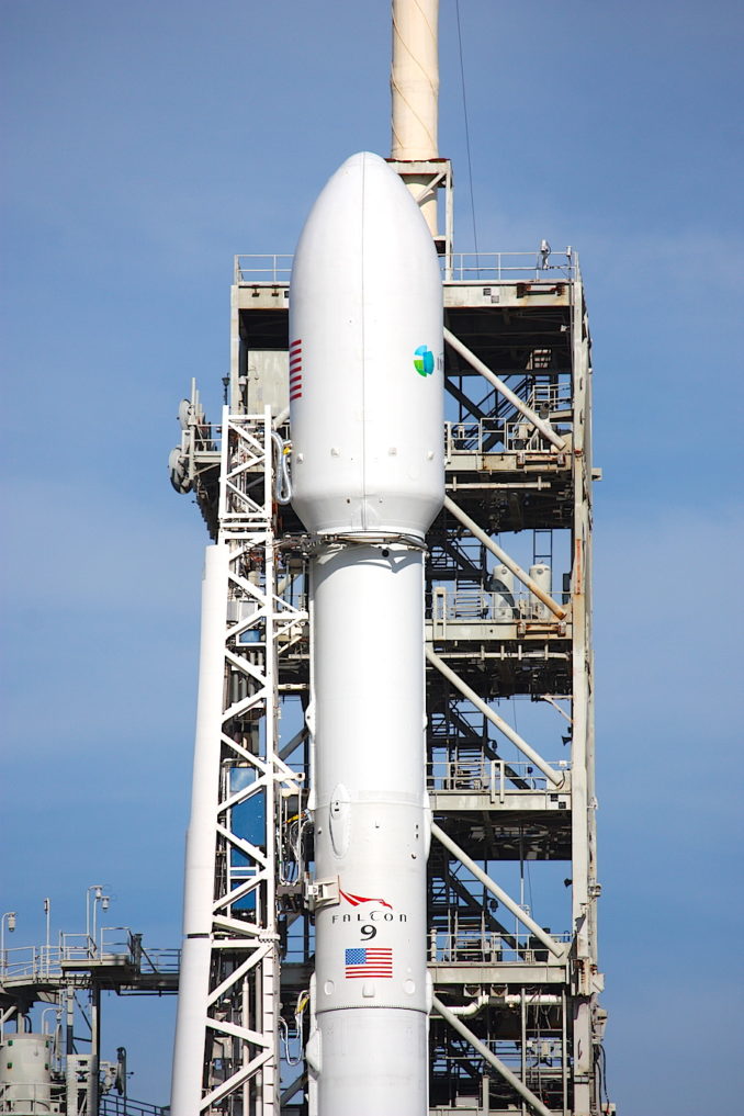 Photos: Expendable Falcon 9 launcher raised vertical at pad 39A ...