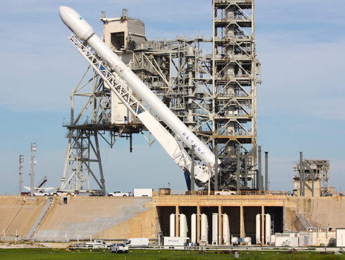 Photos: Expendable Falcon 9 launcher raised vertical at pad 39A ...