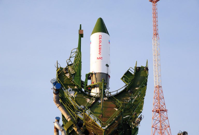 Soyuz rocket positioned on launch pad for station resupply flight ...