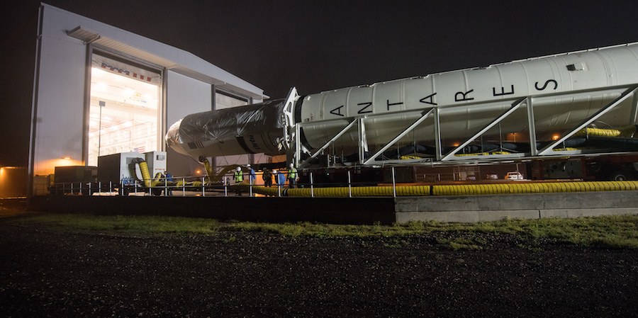 Antares rocket rolls to Virginia launch pad, liftoff delayed to Monday ...