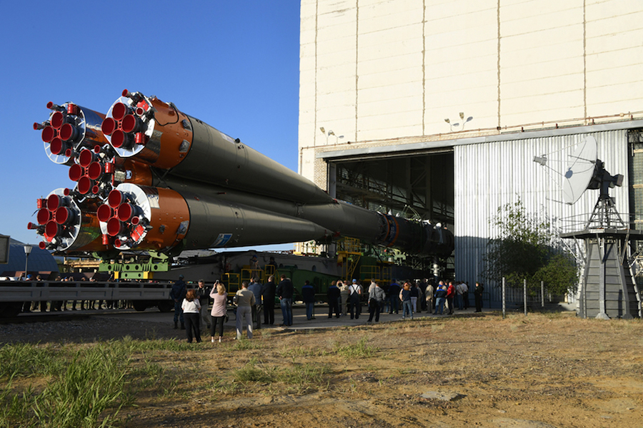 Soyuz rocket for next station crew transferred to launch pad in ...