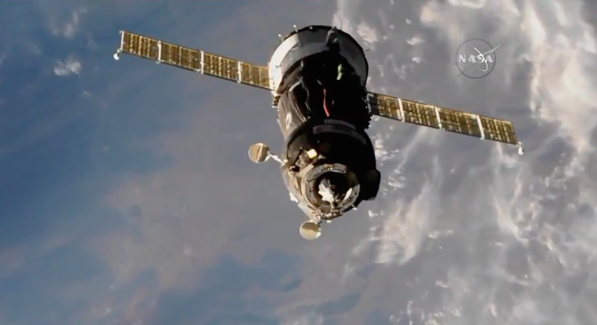 Soyuz delivers crew of three to International Space Station ...