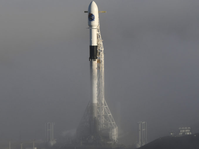Photos: Falcon 9 vertical on the launch pad – Spaceflight Now