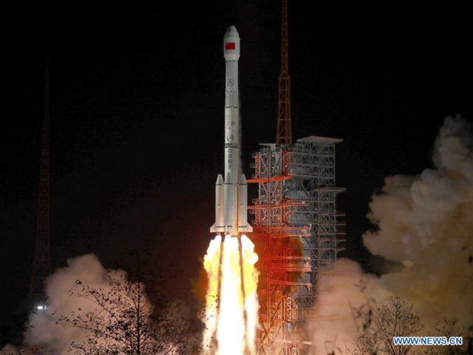 In an eerie scene, Chinese villagers visit rocket crash site ...