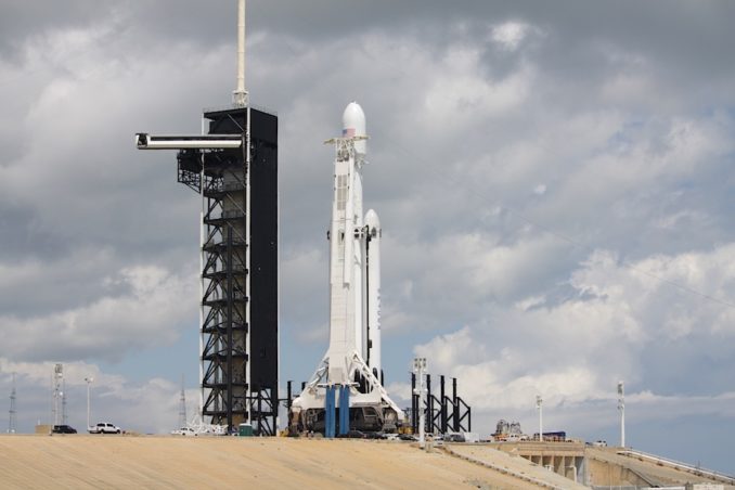 Photos: Falcon Heavy raised vertical at pad 39A – Spaceflight Now