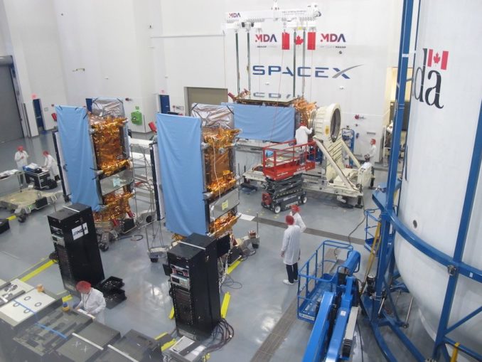 Photos: Radarsat satellites encapsulated in Falcon 9 payload fairing ...