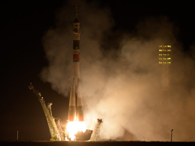 Photos: Soyuz crew capsule parachutes to landing in Kazakhstan ...