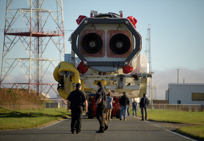 Upgraded Antares rocket rolled out for launch on space station resupply ...