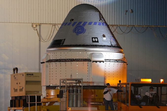 Photos: Boeing’s Starliner spacecraft rolls out of factory ...