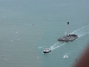 SpaceX’s reusable Falcon booster returns to port after crew launch ...