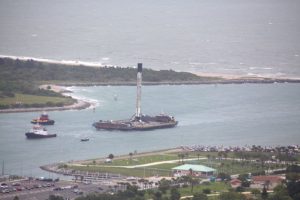 SpaceX’s reusable Falcon booster returns to port after crew launch ...