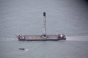 SpaceX’s reusable Falcon booster returns to port after crew launch ...