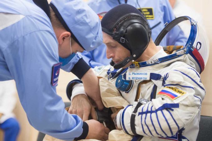 Photos: Soyuz launches new station crew with spectacular autumn ...