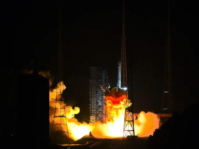 In an eerie scene, Chinese villagers visit rocket crash site ...