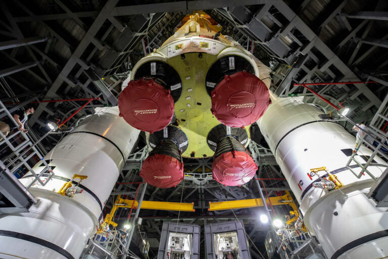 NASA bolts Space Launch System core stage to solid rocket boosters ...