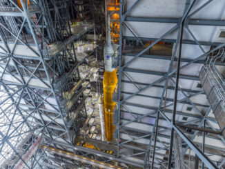 Photos: Falcon 9 booster stands upright after landing – Spaceflight Now