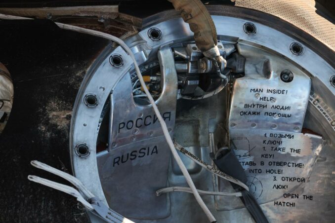 Damaged Russian Soyuz capsule returns to Earth without a crew ...