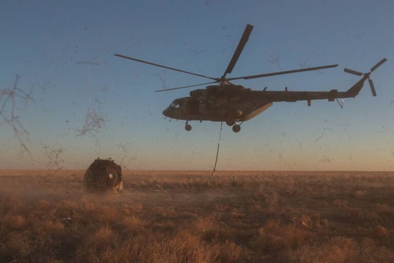 Damaged Russian Soyuz capsule returns to Earth without a crew ...