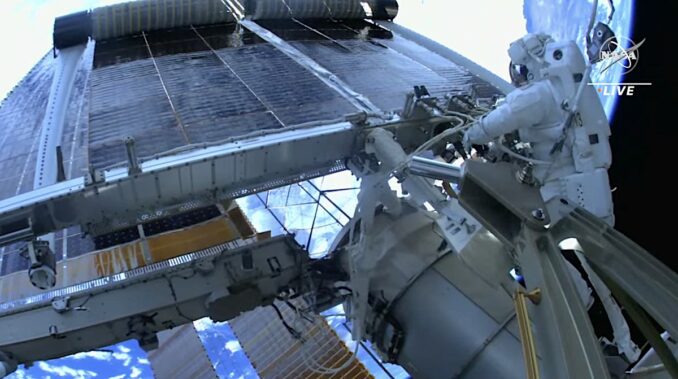 Astronauts install new roll-out solar array outside International Space ...
